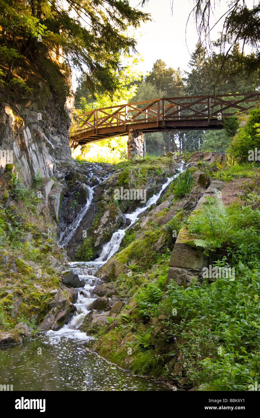 Waterfall and bridge over the river Stock Photo - Alamy