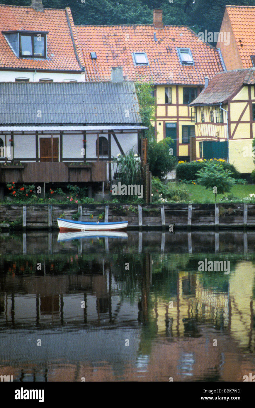 denmark lake boat half-timbered house water reflection calm peace Stock ...