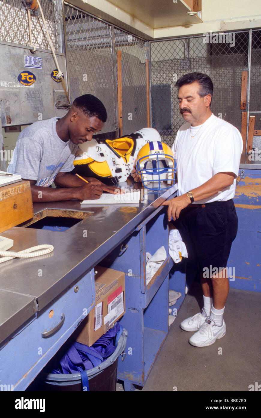 gym trainer men sport equipment manage control supervise check out ...