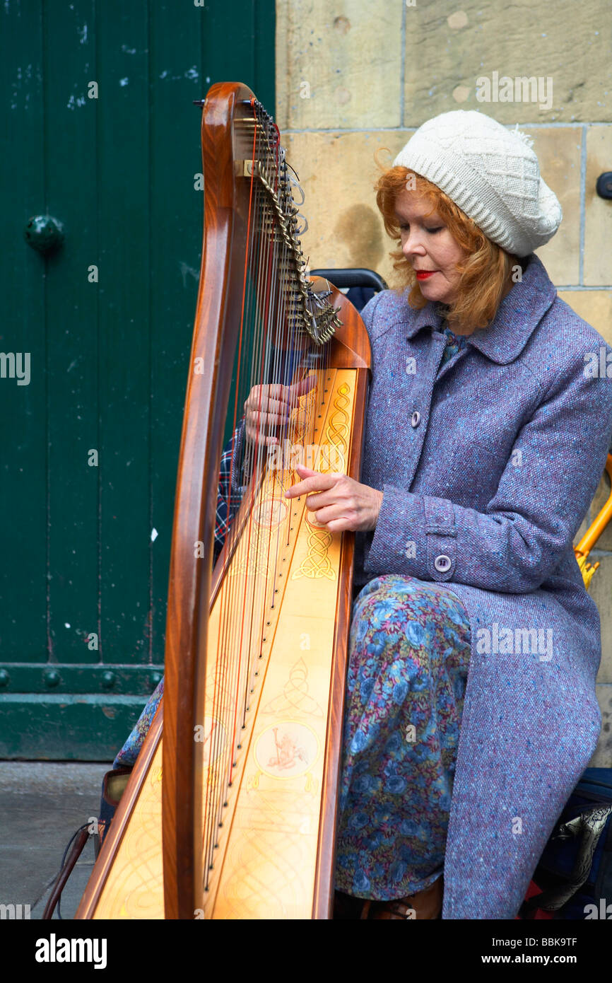 Woman harp ireland hi-res stock photography and images - Alamy