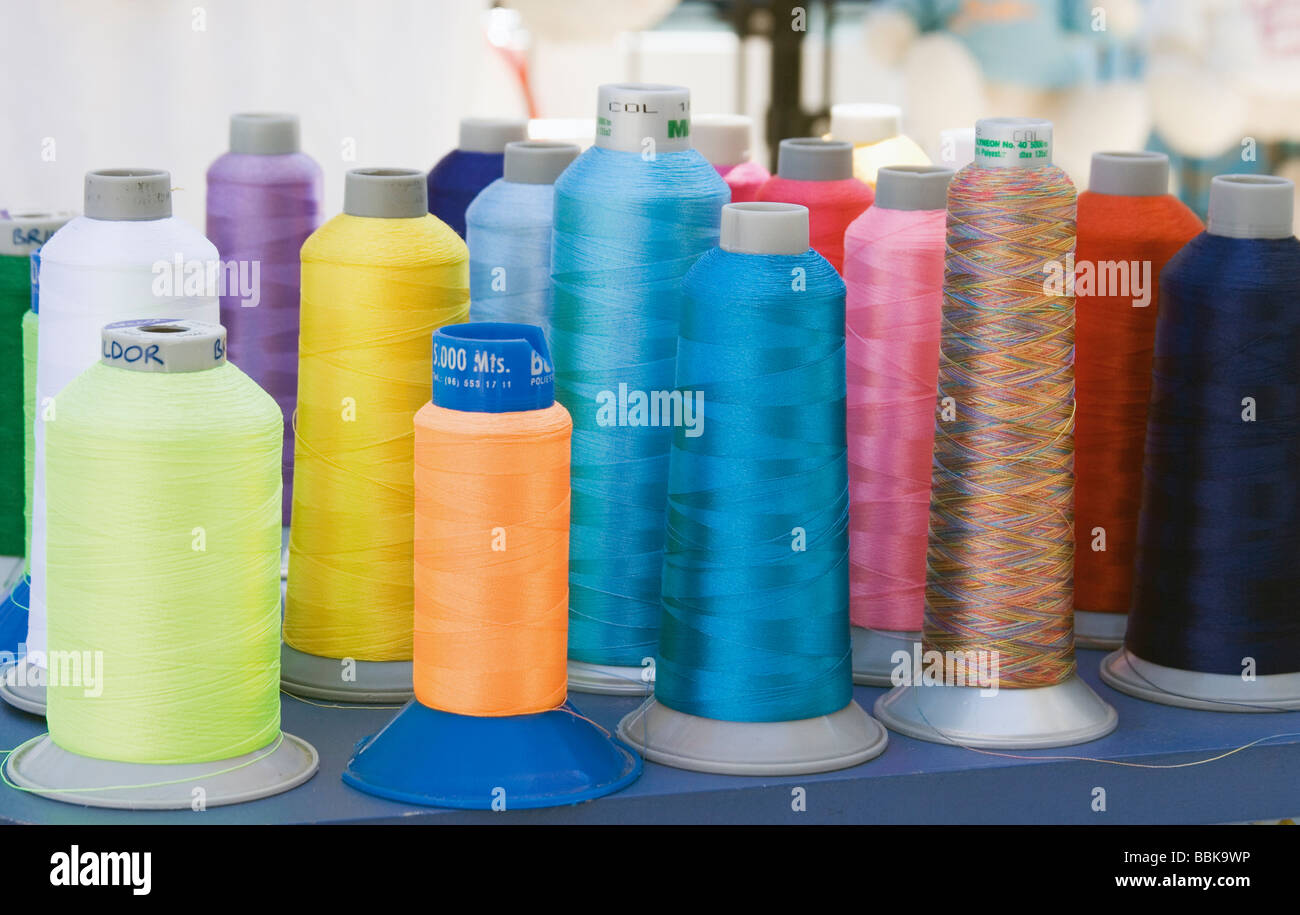 Reels of brightly coloured cotton Stock Photo - Alamy