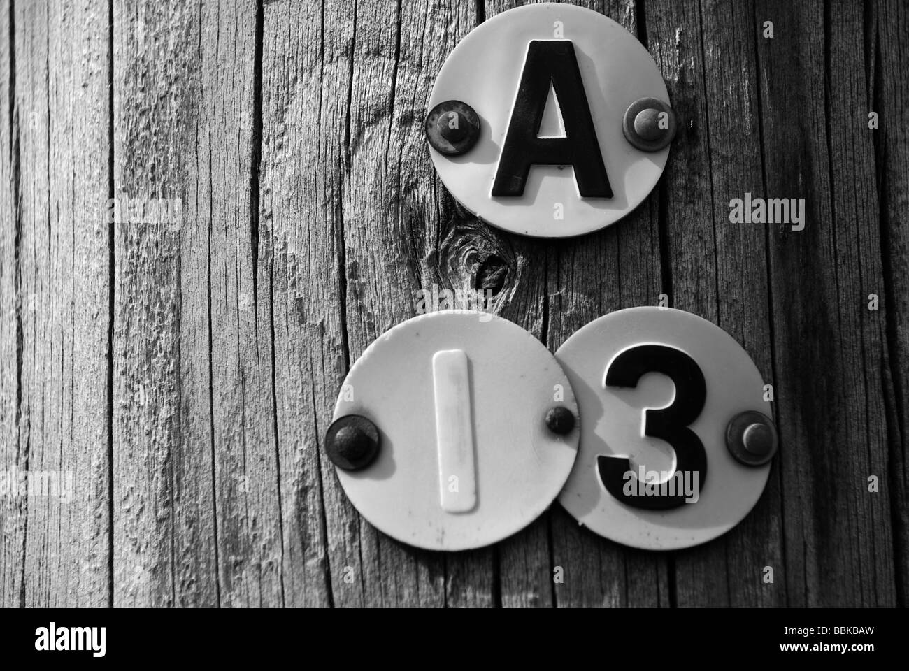 A13 signs on wooden post Stock Photo - Alamy