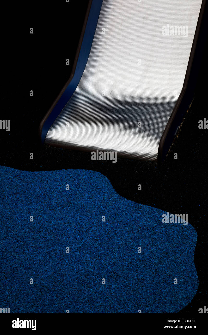 Slide and blue puddle Stock Photo - Alamy