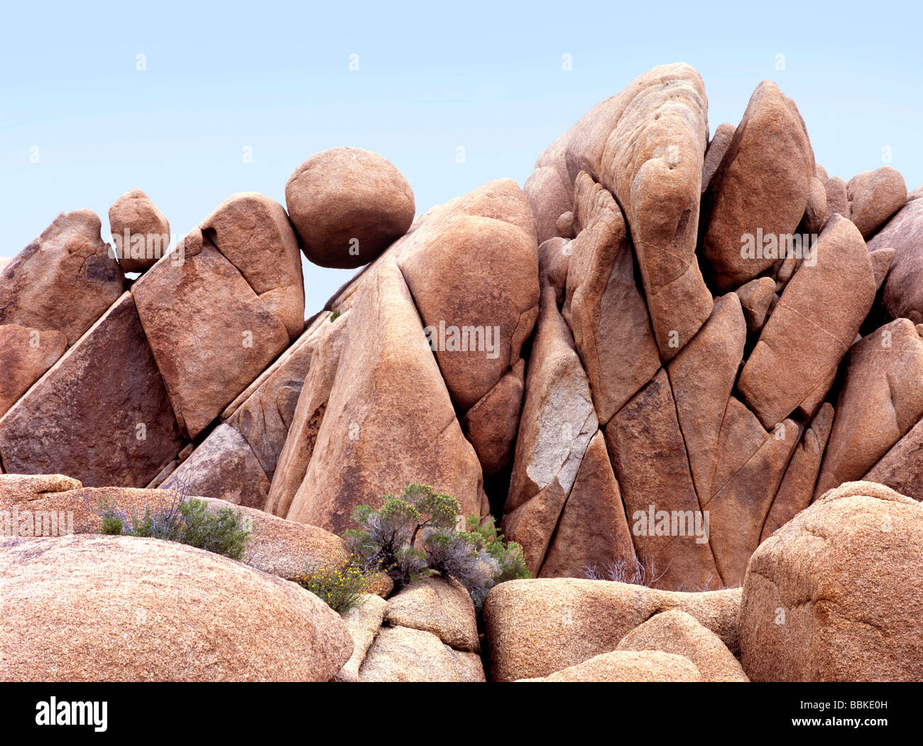 This round boulder over four feet in diameter is balanced on a rocky ...