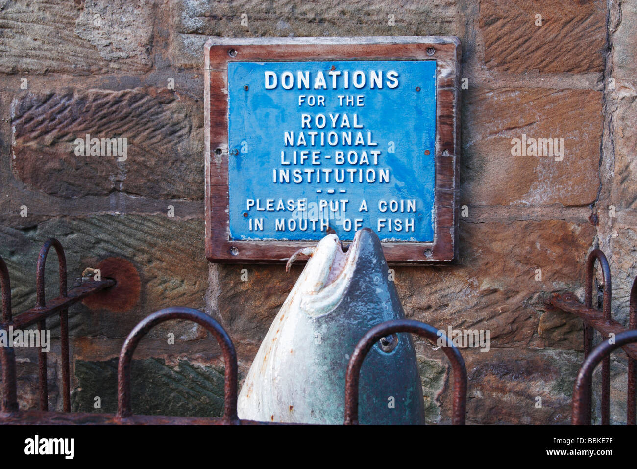 Royal National Lifeboat institution donation box in Robin Hoods Bay in ...