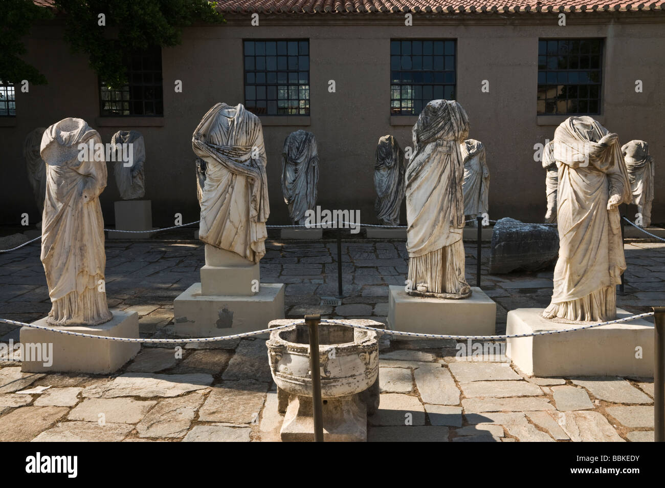 A display of headless statues in the museum courtyard at Ancient ...