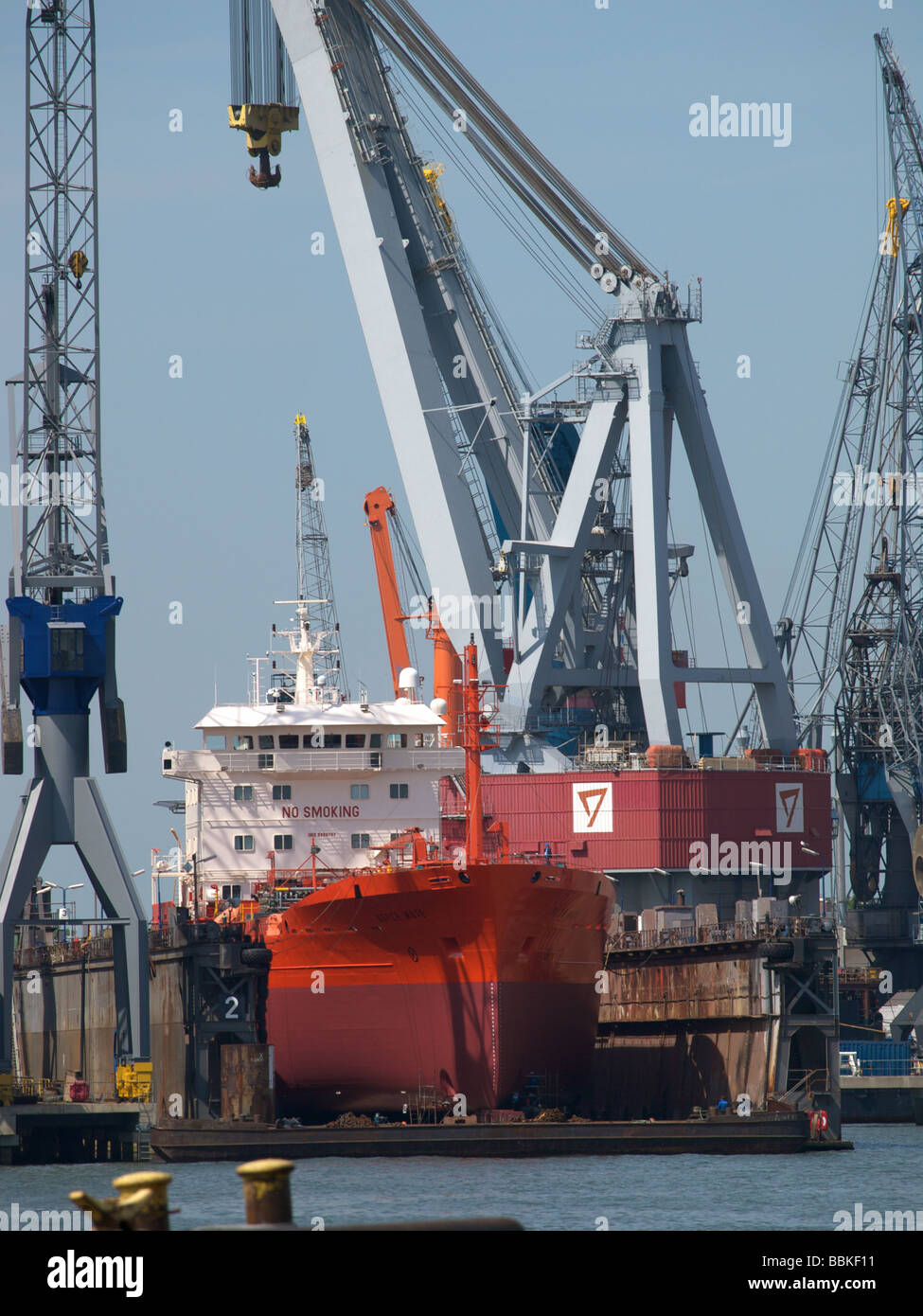 Ship in dry dock for maintenance below the waterline Rotterdam port ...