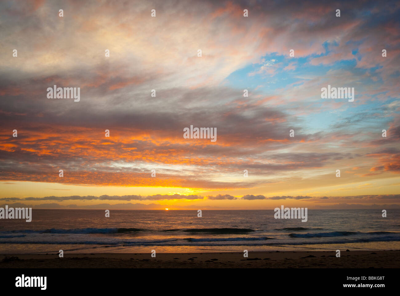 Sunrise over ocean Stock Photo - Alamy