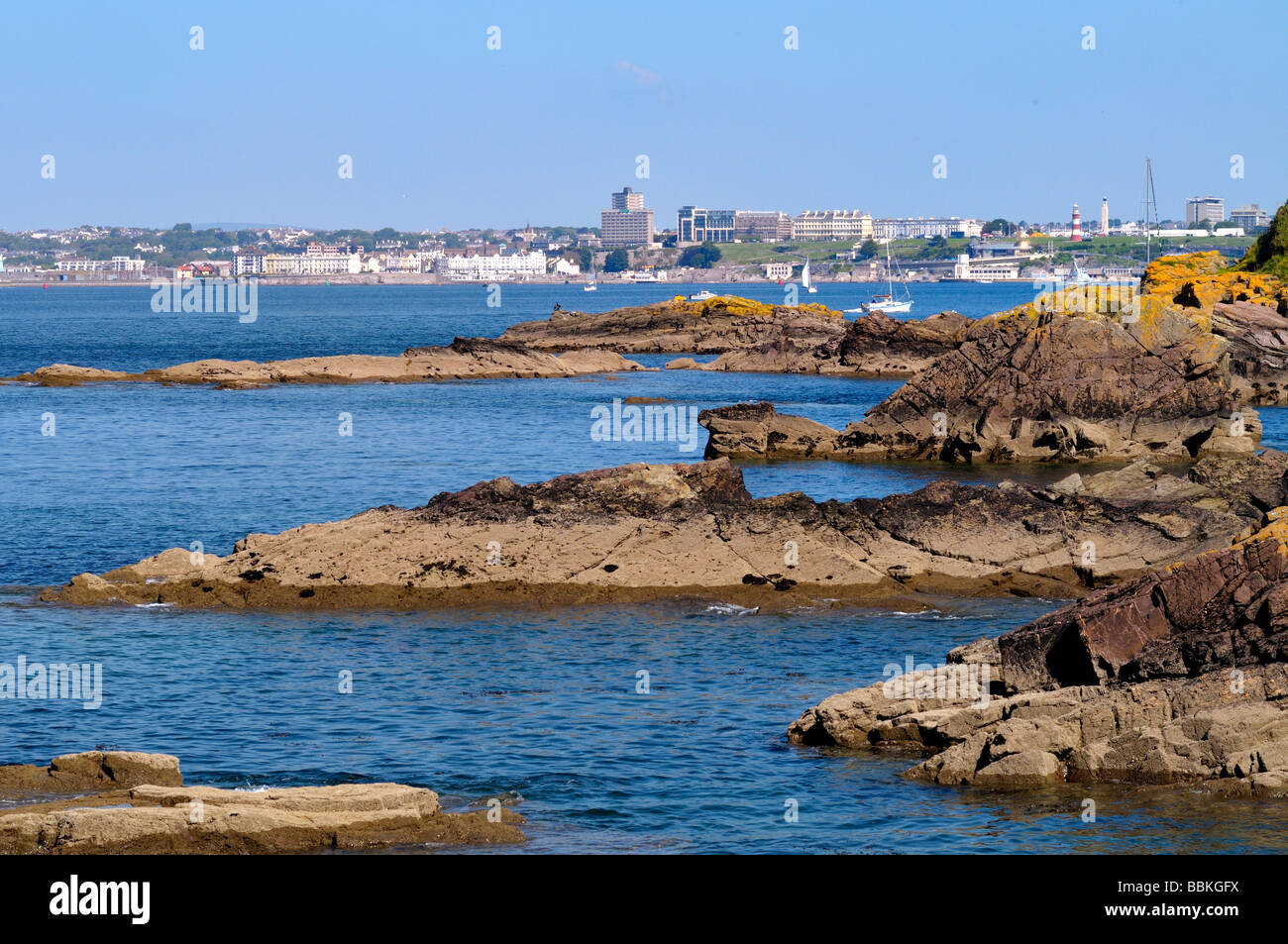 Rocky shoreline by Fort Bovisand looking toward Plymouth sound and ...