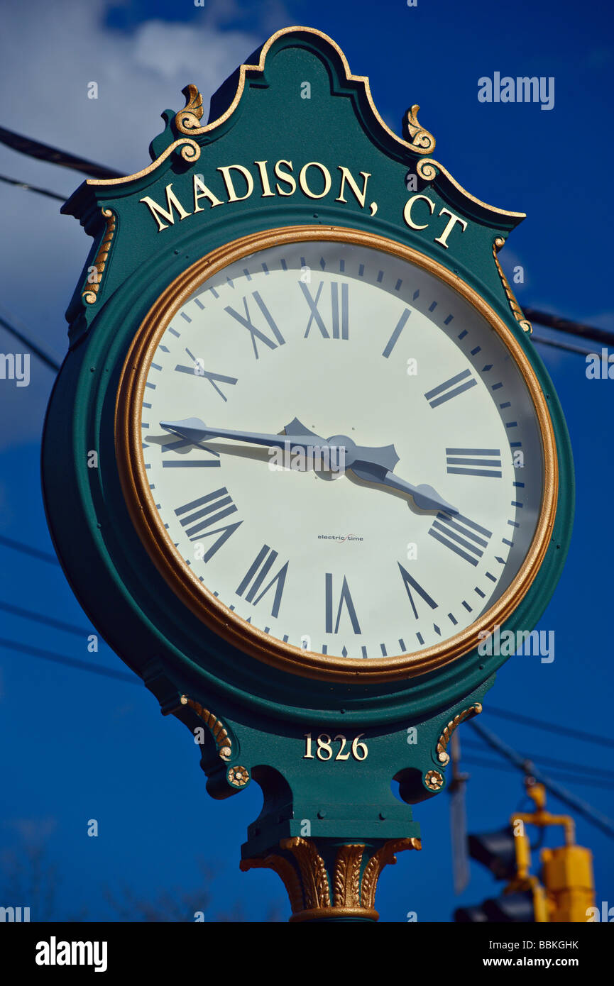 Clock on sidewalk near intersection of Boston Post Road and Wall Street ...