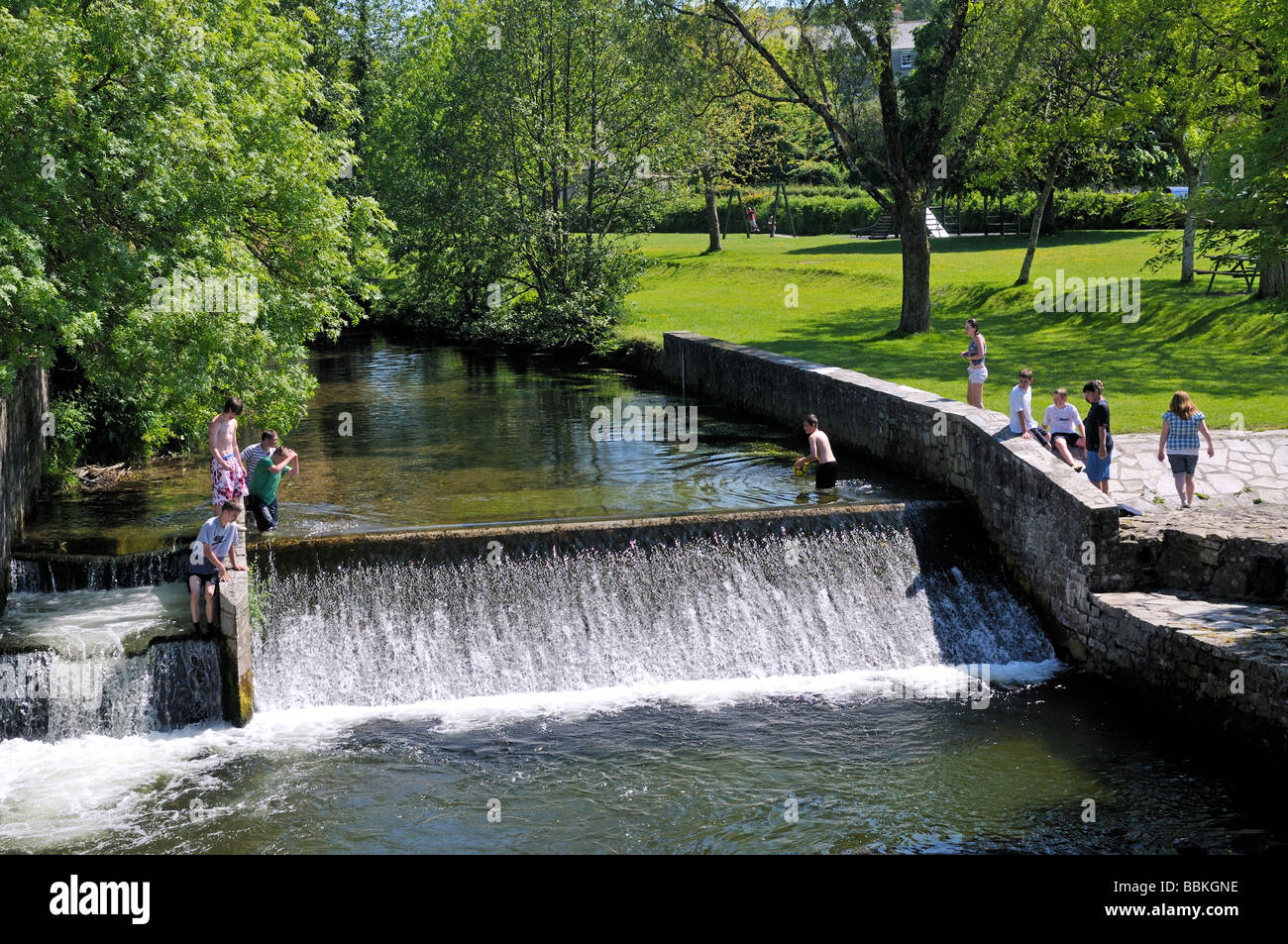 Children playing in the River Walkham by the weir at Horrabridge ...