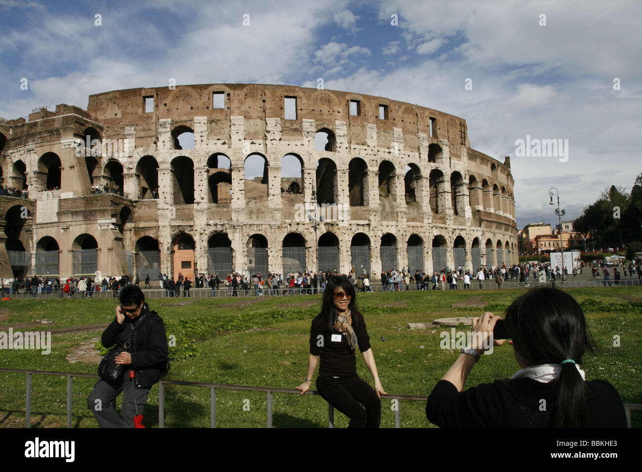 people by colosseum amphitheatre outside exterior wall facade, rome ...
