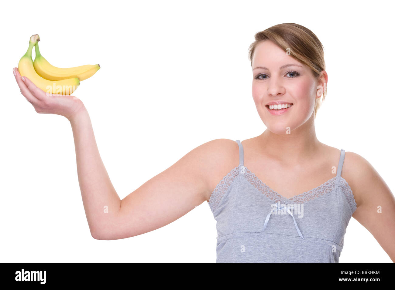 Full isolated portrait of a beautiful caucasian woman with some bananas ...