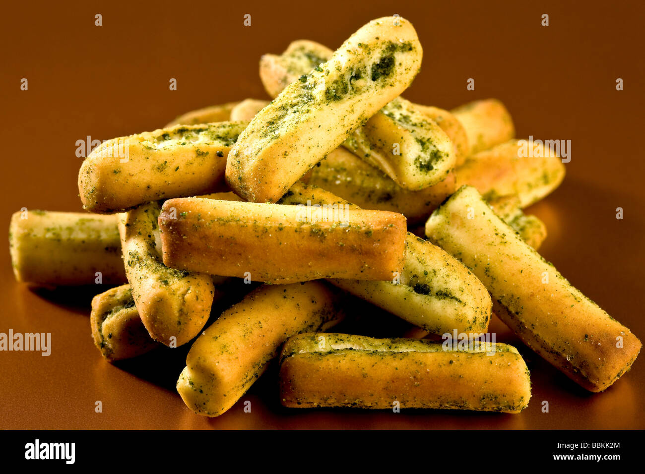 Grissini snacks with garlic and parsley Stock Photo - Alamy