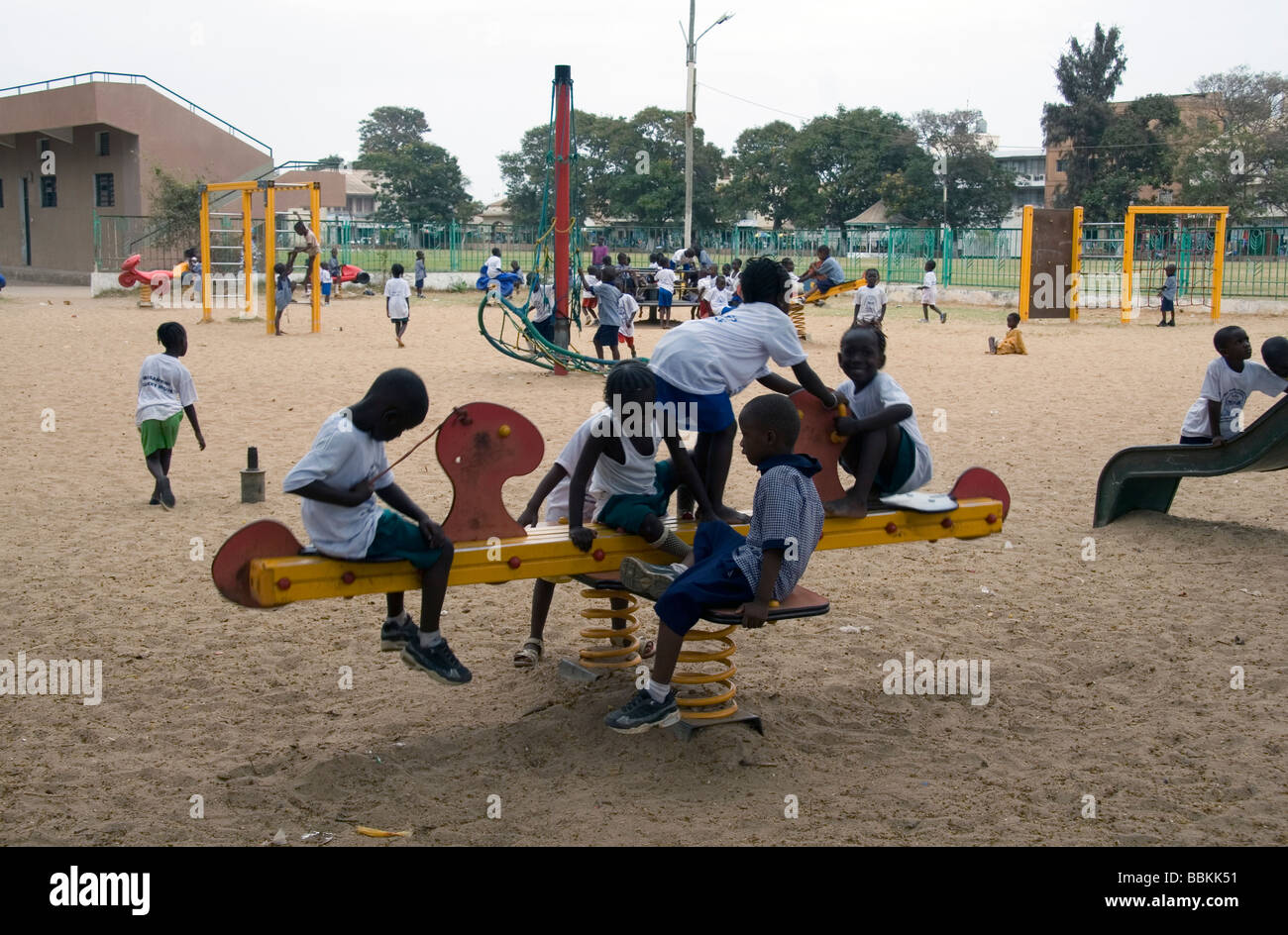 Young children playing in playground Banjul Gambia West Africa Stock ...