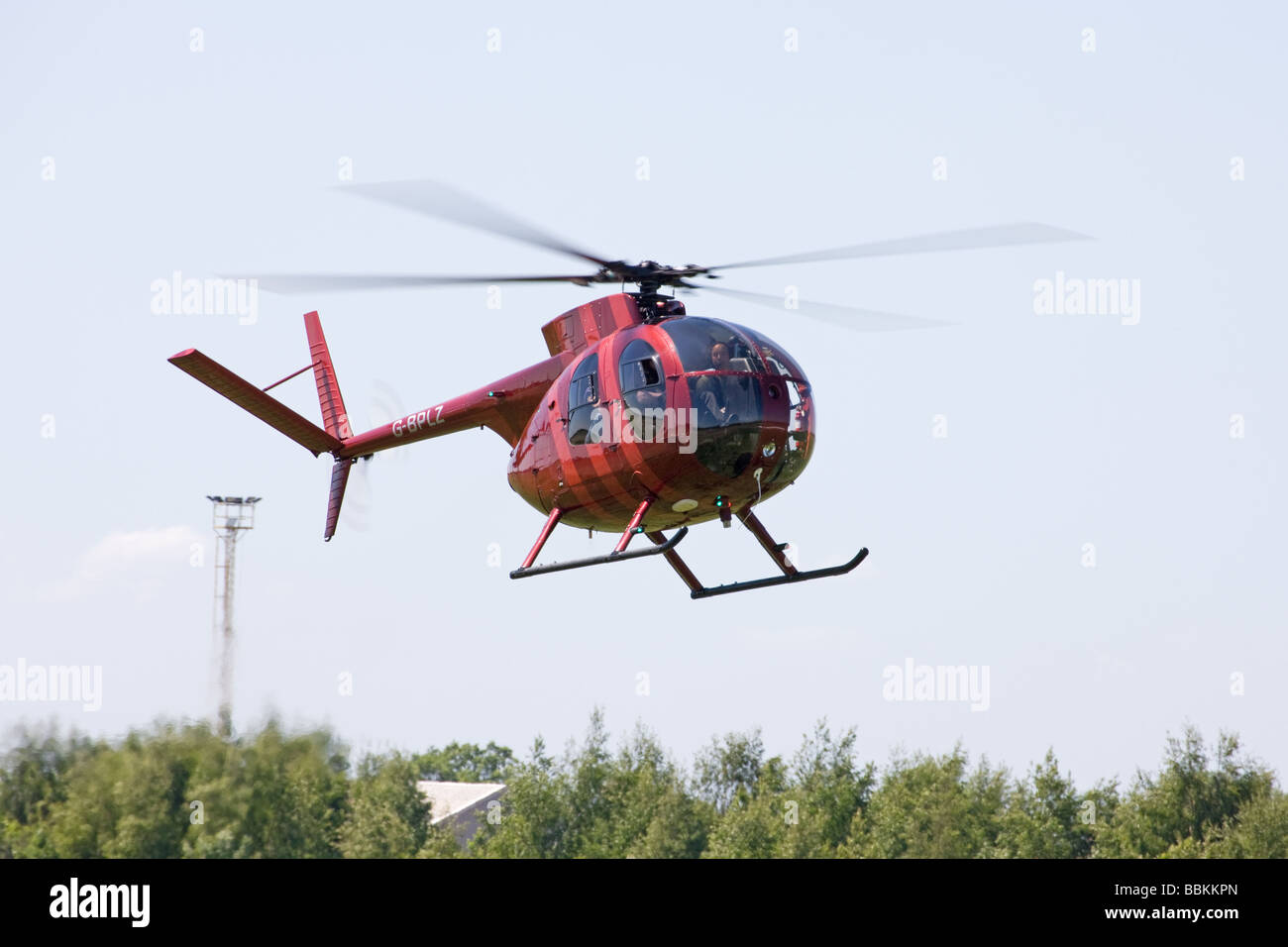 Hughes 369HS 500 G-BPLZ in flight hovering at Sandtoft Airfield Stock ...