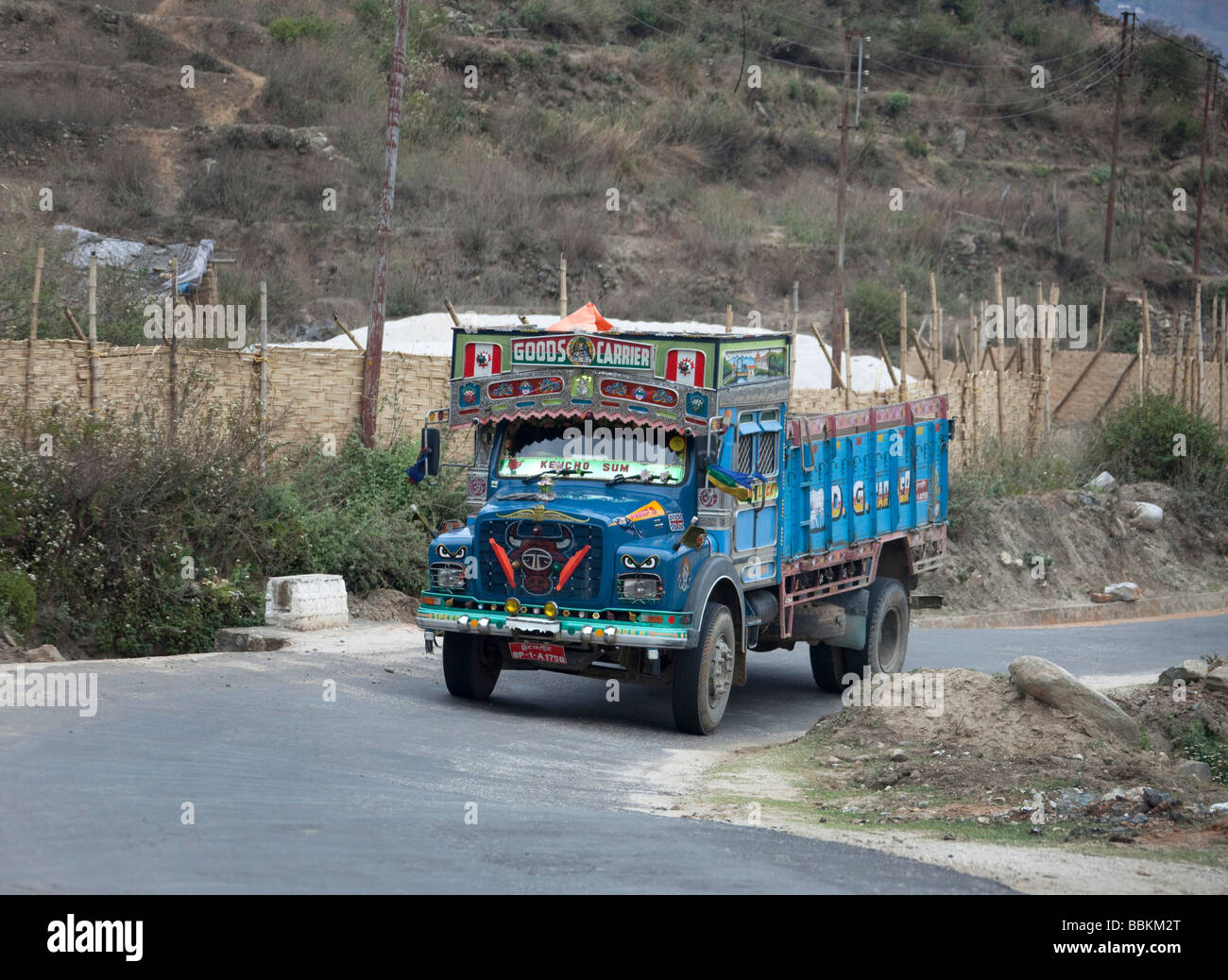 Colourful lorry transporting goods. Tata Bhutan Asia. Decorated in ...