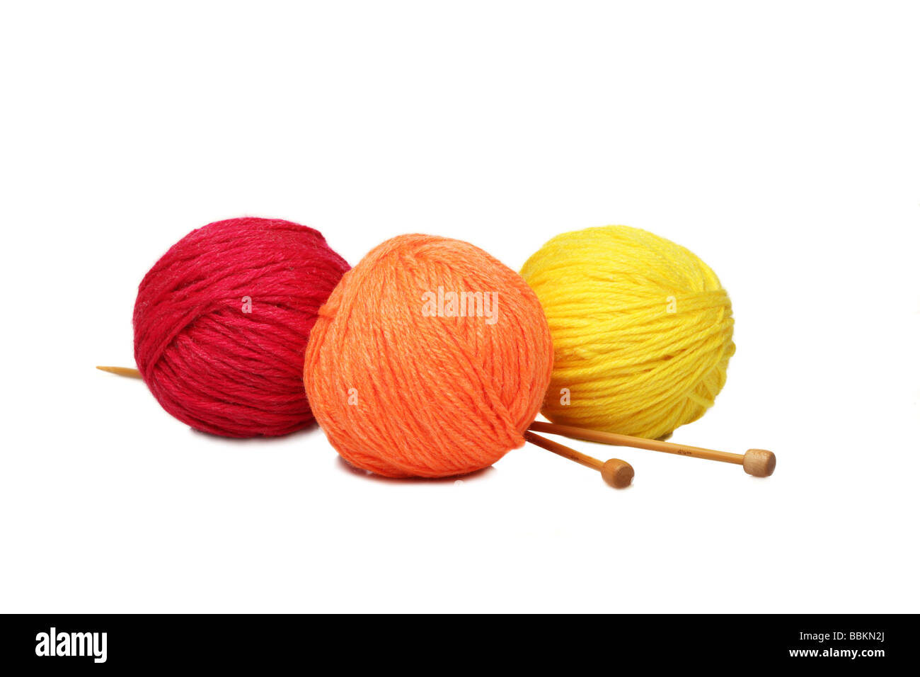 Colorful yarn balls with needles Stock Photo - Alamy