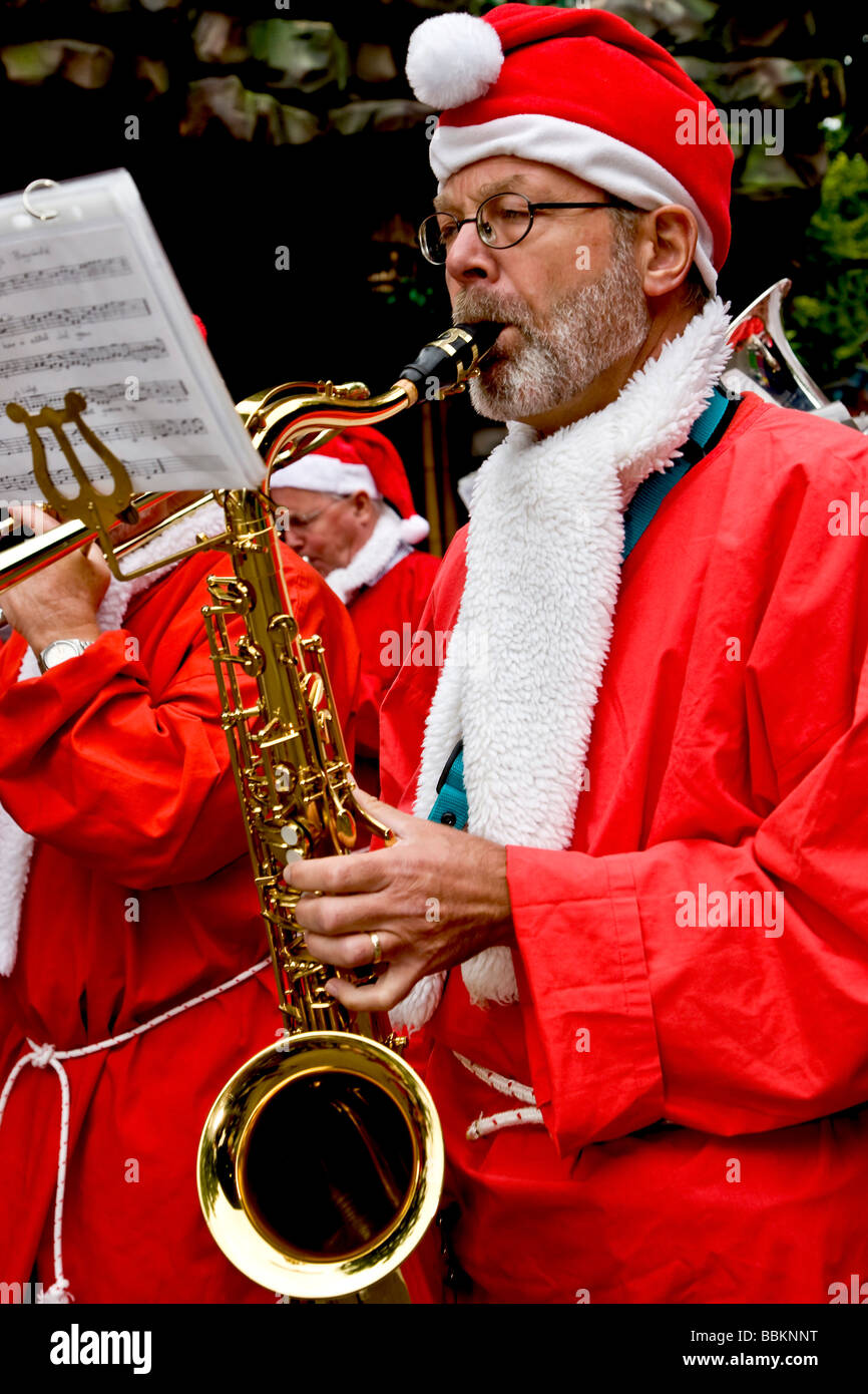 The saxophonist in the band playing at the Santa Claus parade, Bakken ...