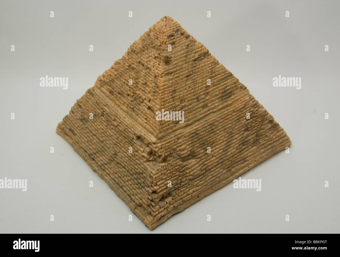 Toy pyramid photographed against a white background Stock Photo - Alamy