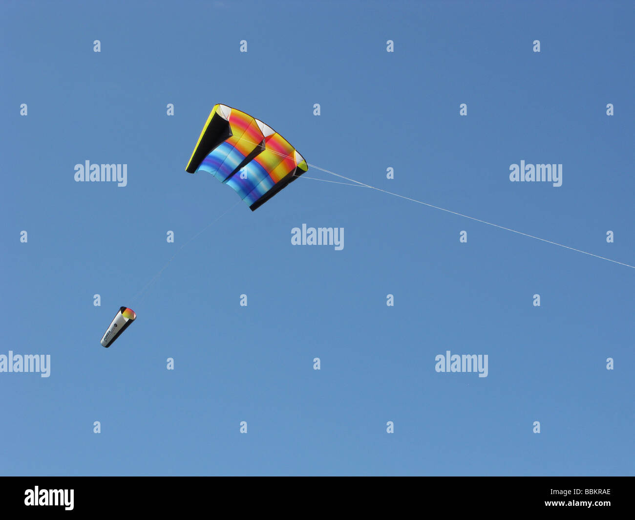 solitary kite in a string,landscape,clear blue sky Stock Photo - Alamy