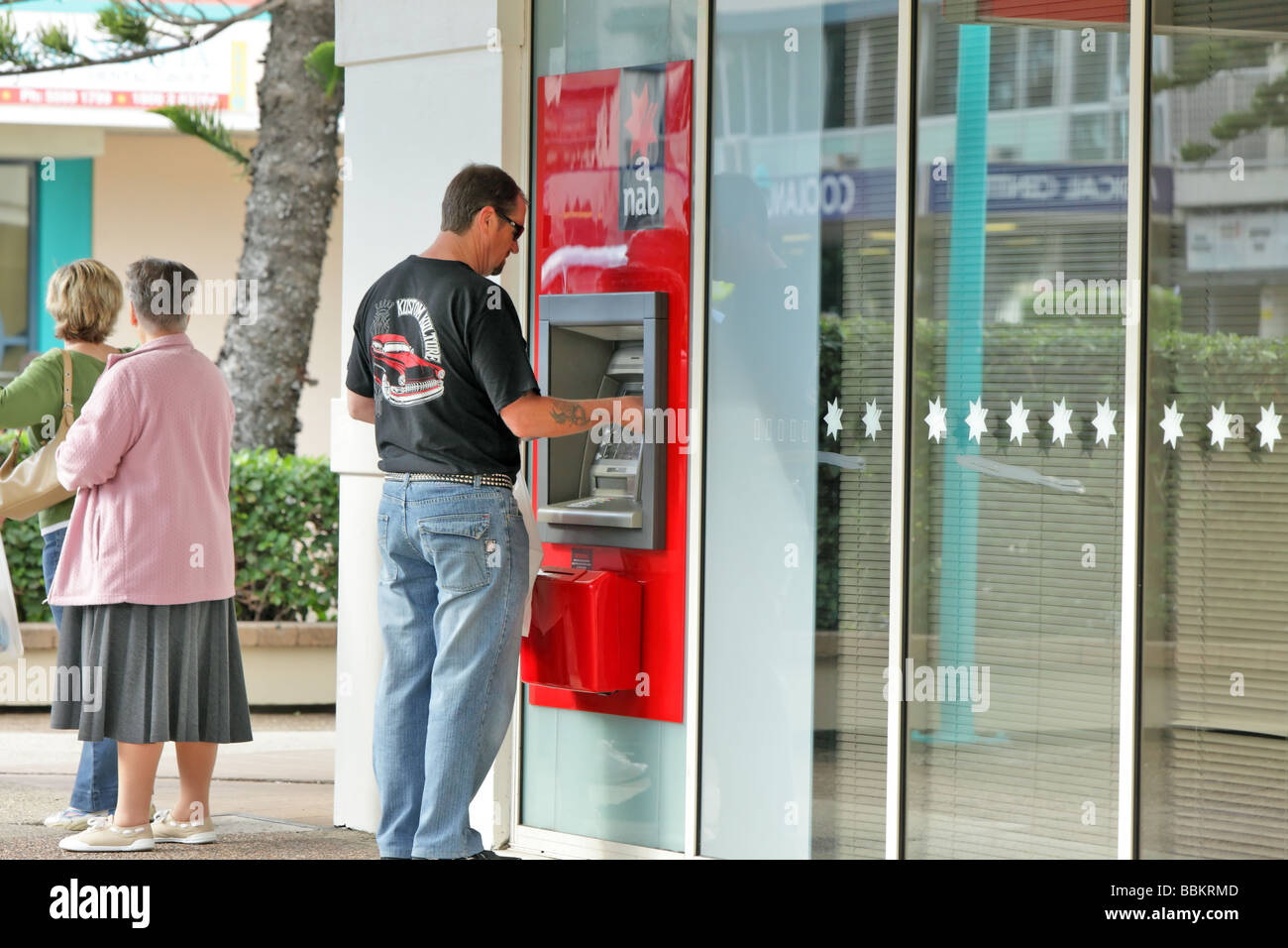Withdrawing money from a hi-res stock photography and images - Alamy