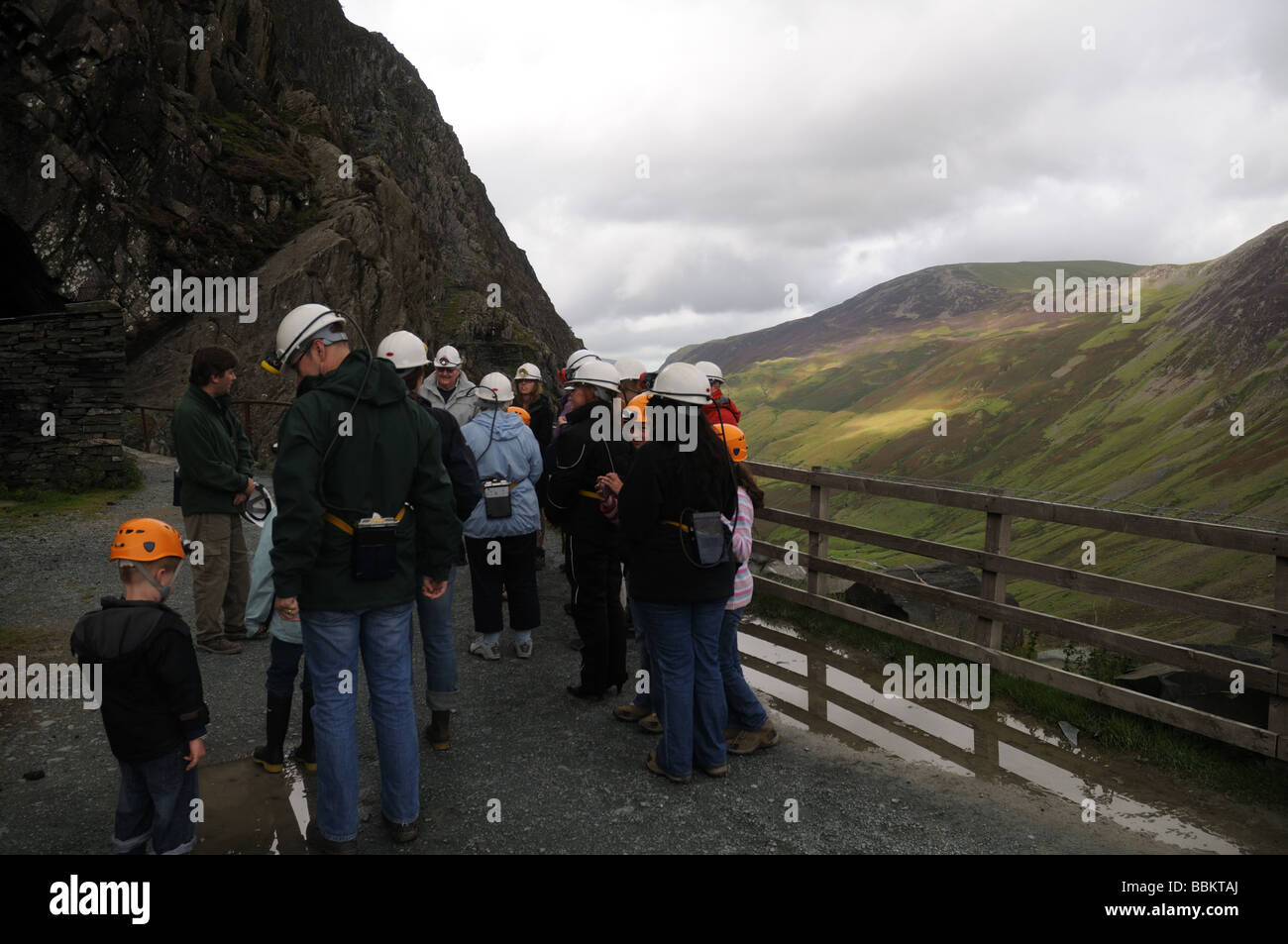 Tour group with guide at the Entrance to Honister Slate Mine, Cumbria ...
