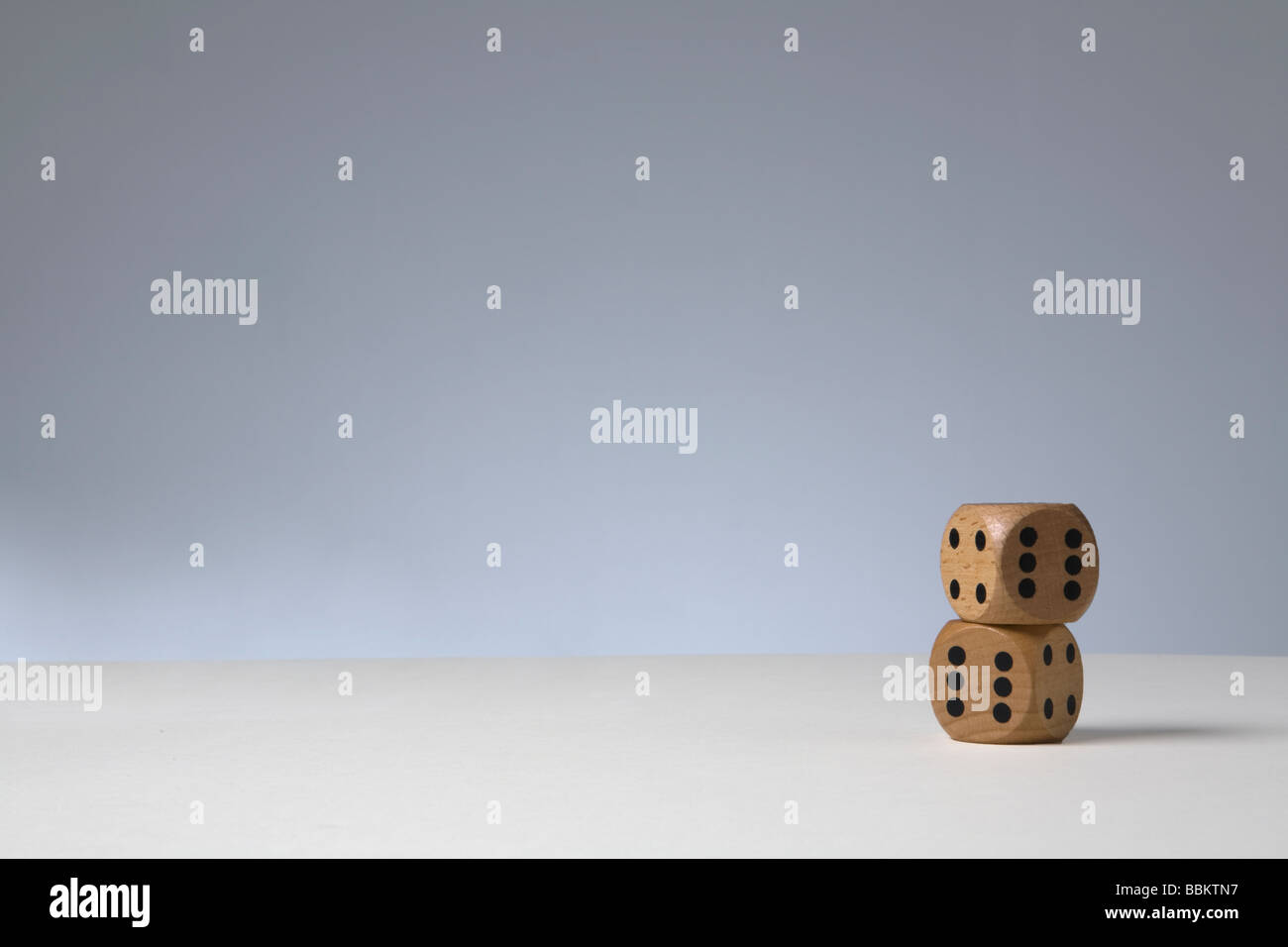 two wooden dice Stock Photo - Alamy