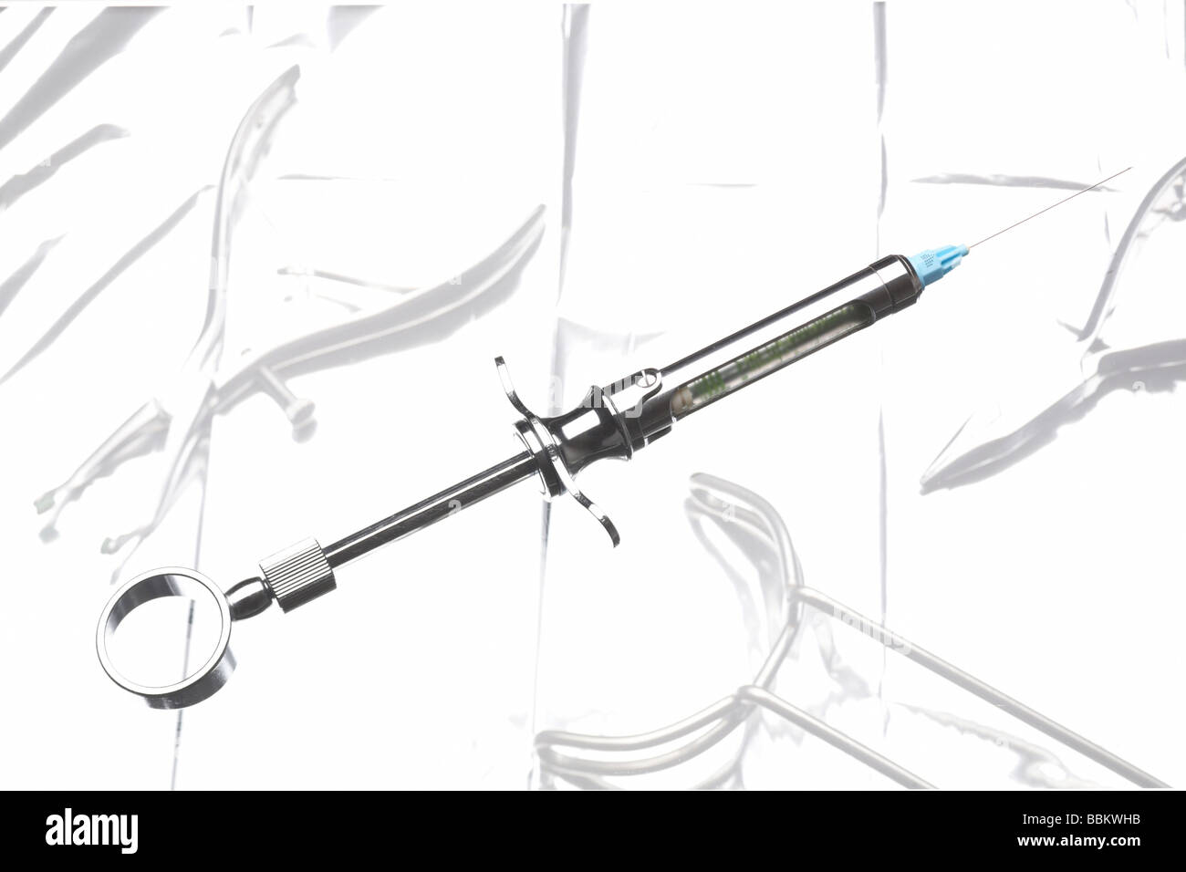 Injection syringe, other tools Stock Photo - Alamy