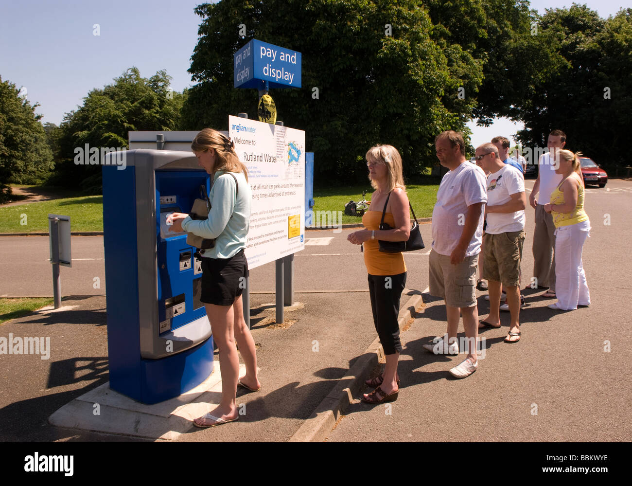Motorists waiting to use pay and display parking machine at Rutland ...