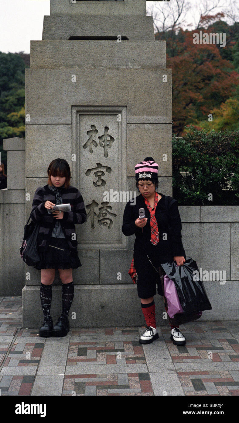 Two teenagers adepts of Cos Play dressing as cartoon characters manga ...