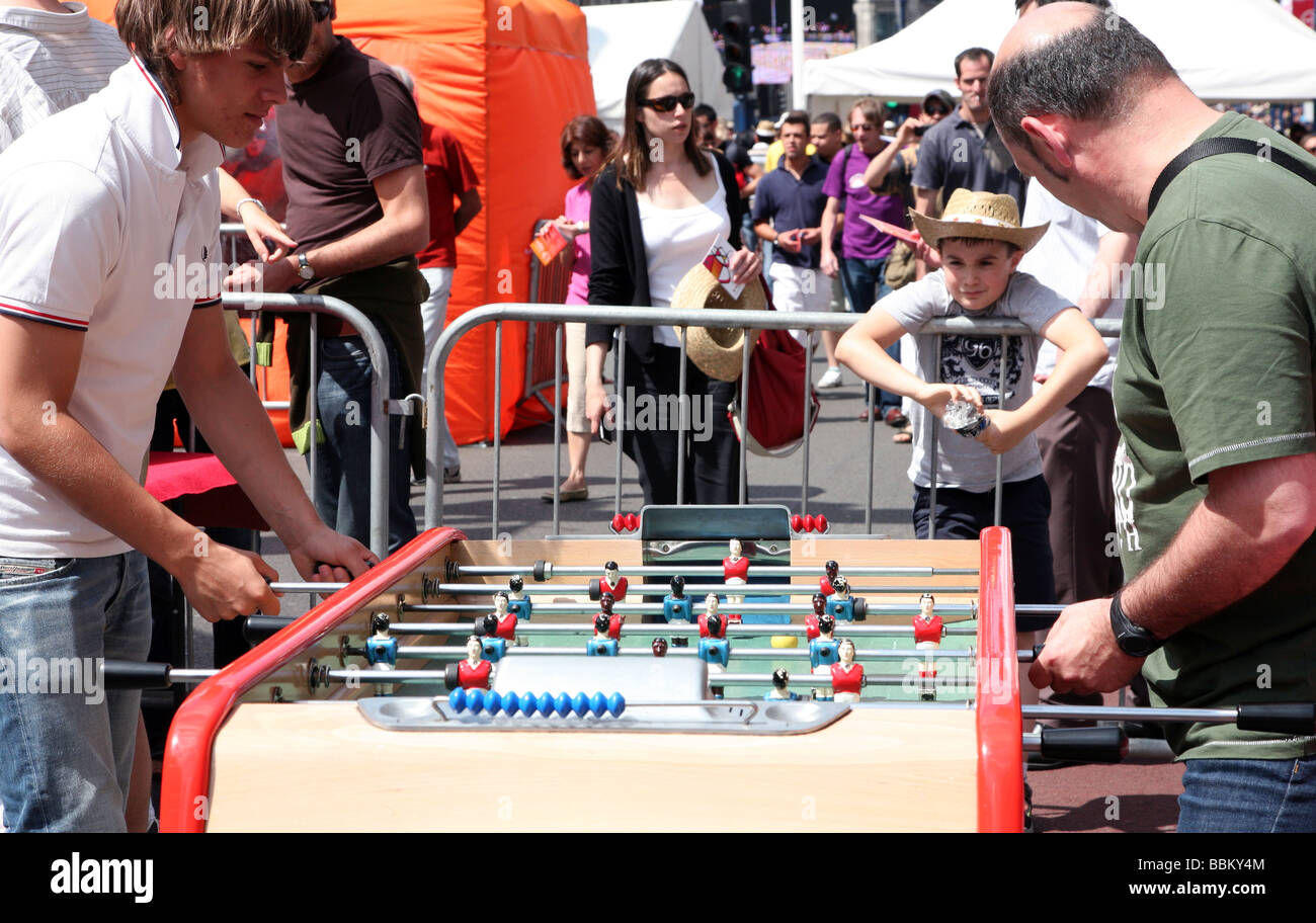 Game of table football at London street festival Stock Photo - Alamy