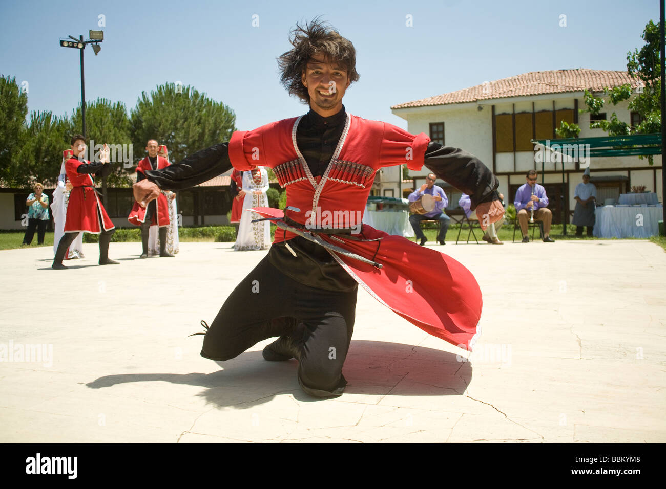 Turkish men & women wear traditional clothes perform eastern Anatolian ...