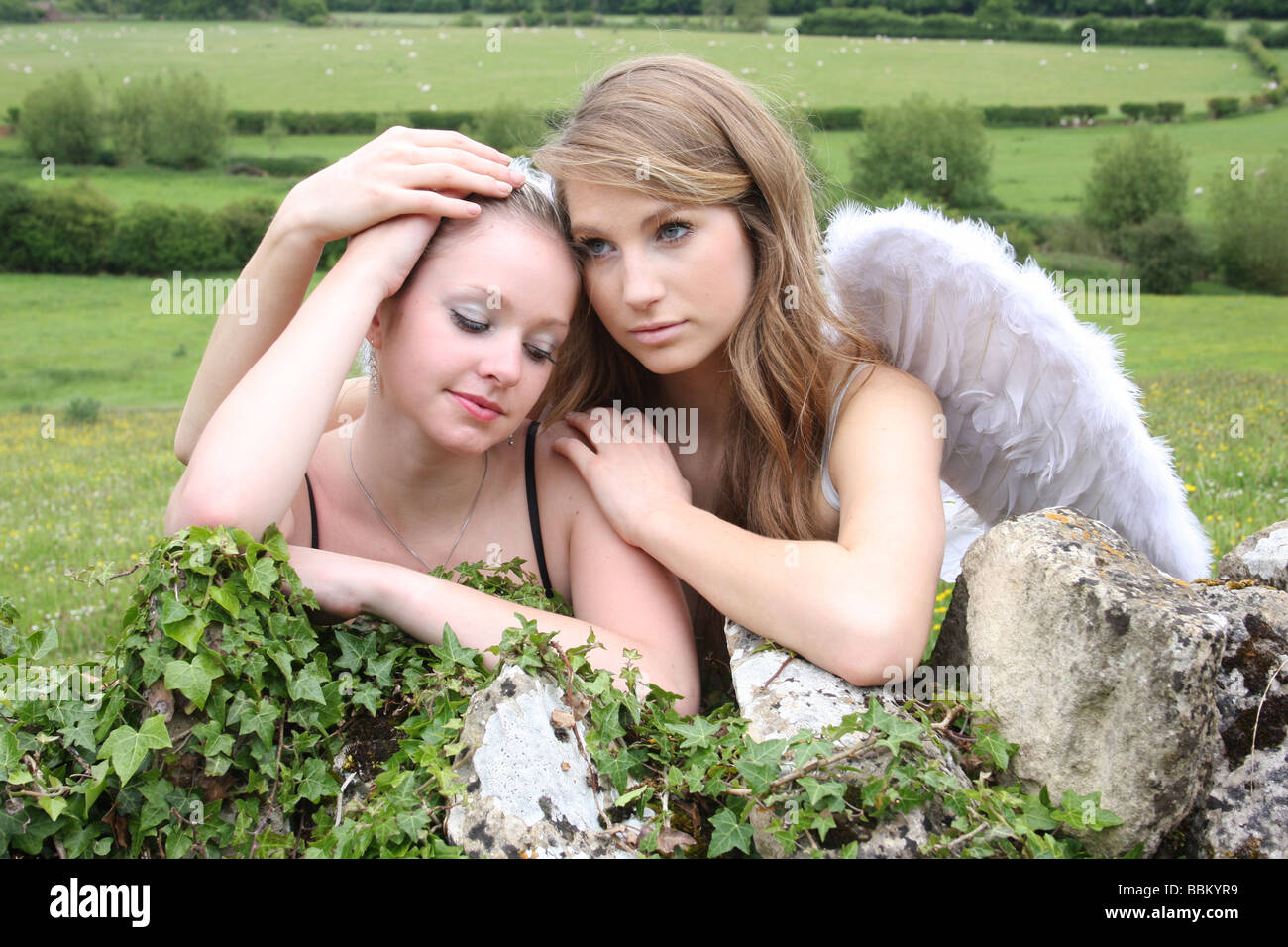 A teenage girl be comforted by her guardian angel Stock Photo - Alamy