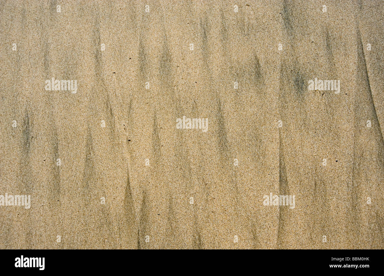 Patterns formed by titanium minerals in the beach sand, Jabu Beach, St ...