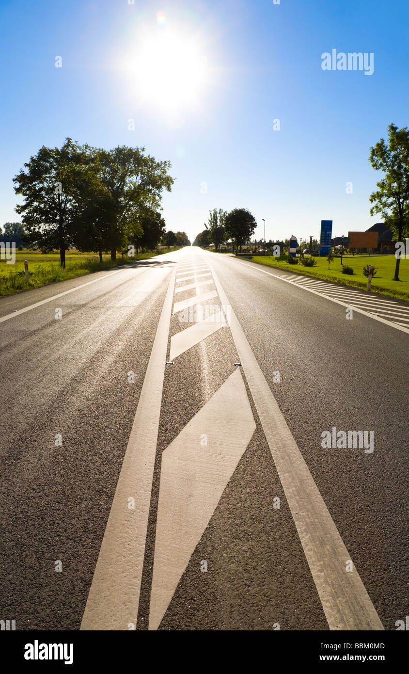 Road with bright sun Wide angle view Stock Photo - Alamy