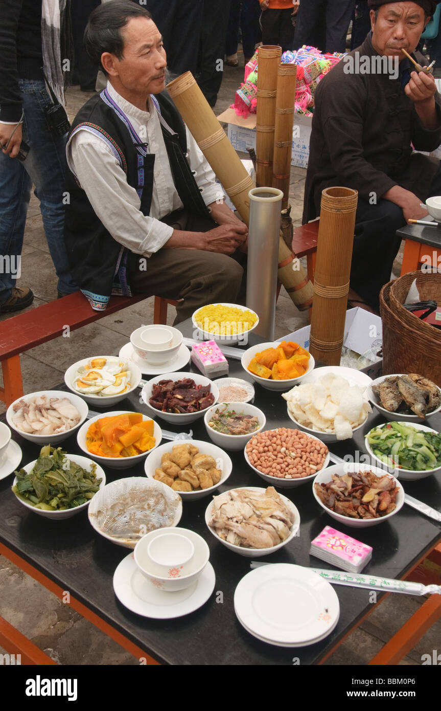 having a smoke at the Long Table Festival in Yuanyang in Yunnan China ...
