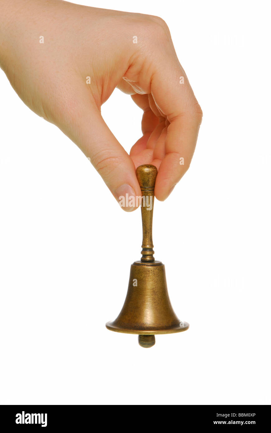 Female hand with bell, symbolic for break's over Stock Photo - Alamy