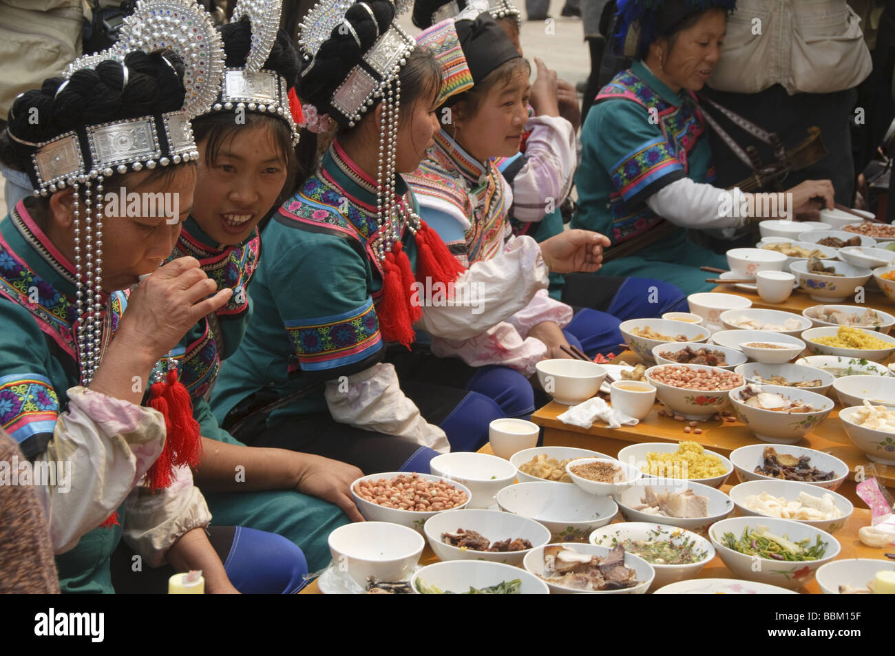 Hani Akha women drinking a toast at the Long Table Festival in Yuanyang ...