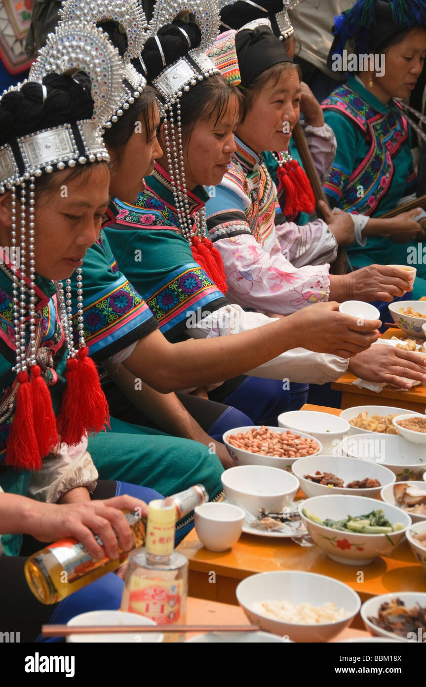 Hani Akha women drinking a toast at the Long Table Festival in Yuanyang ...