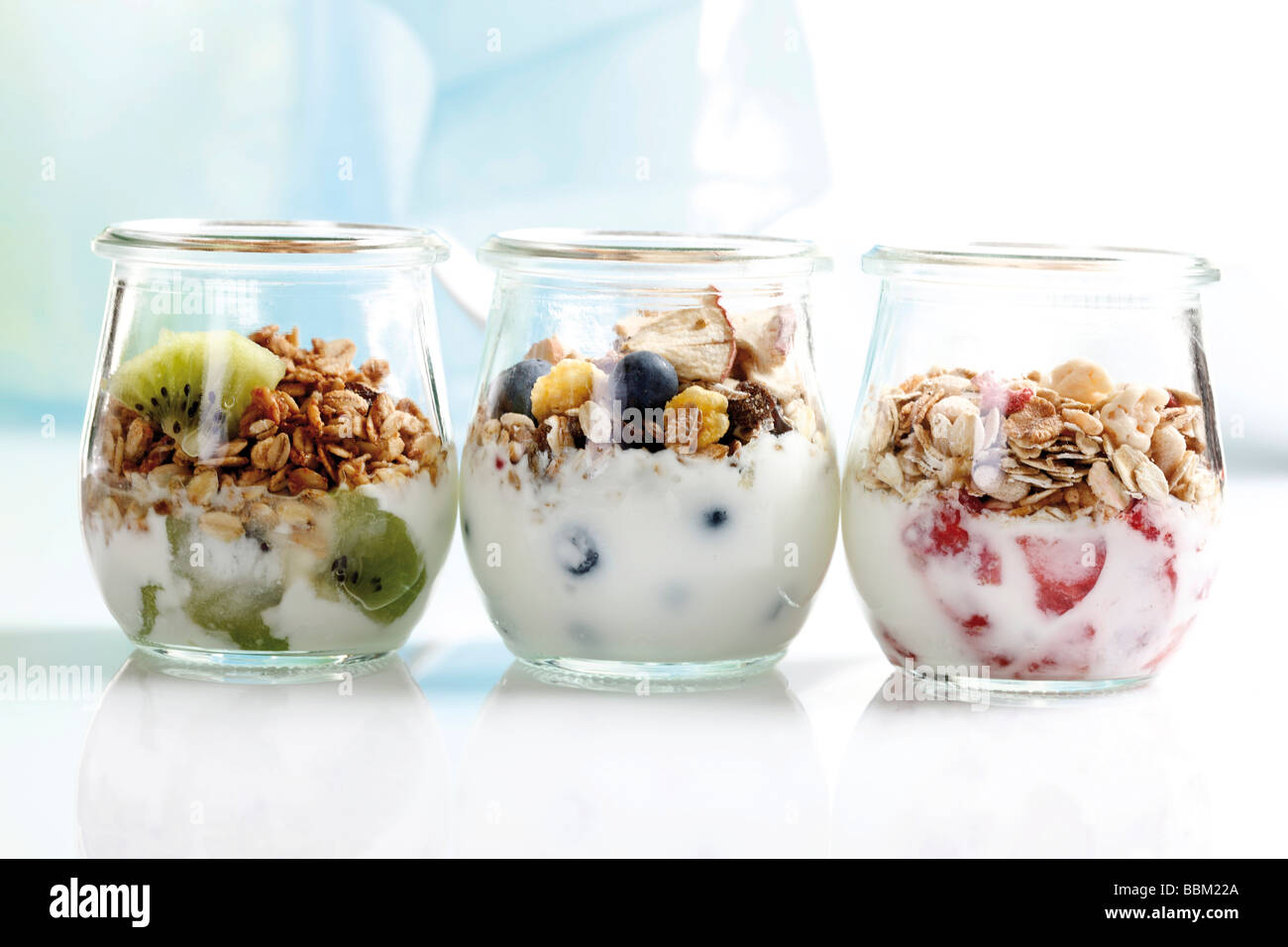 Muesl with yoghurt and fruit in small glass jars Stock Photo - Alamy