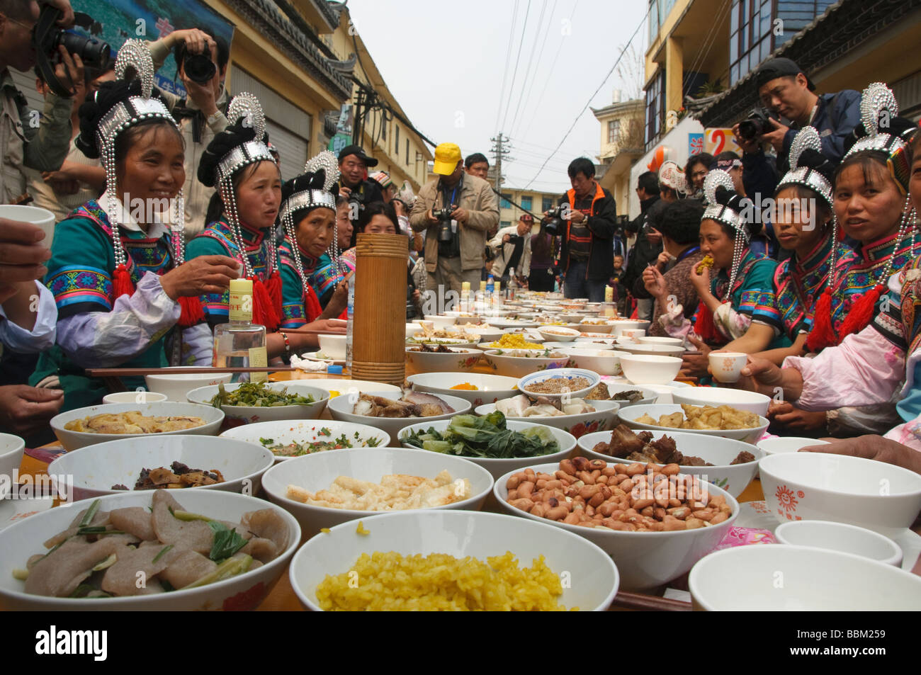 Hani Akha women drinking a toast at the Long Table Festival in Yuanyang ...