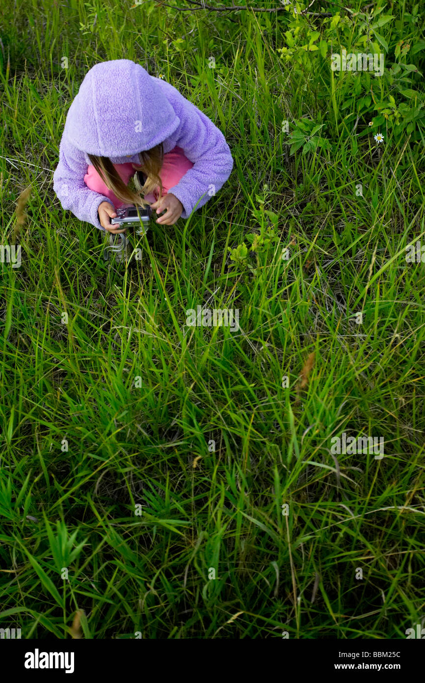 Girl stooping hi-res stock photography and images - Alamy