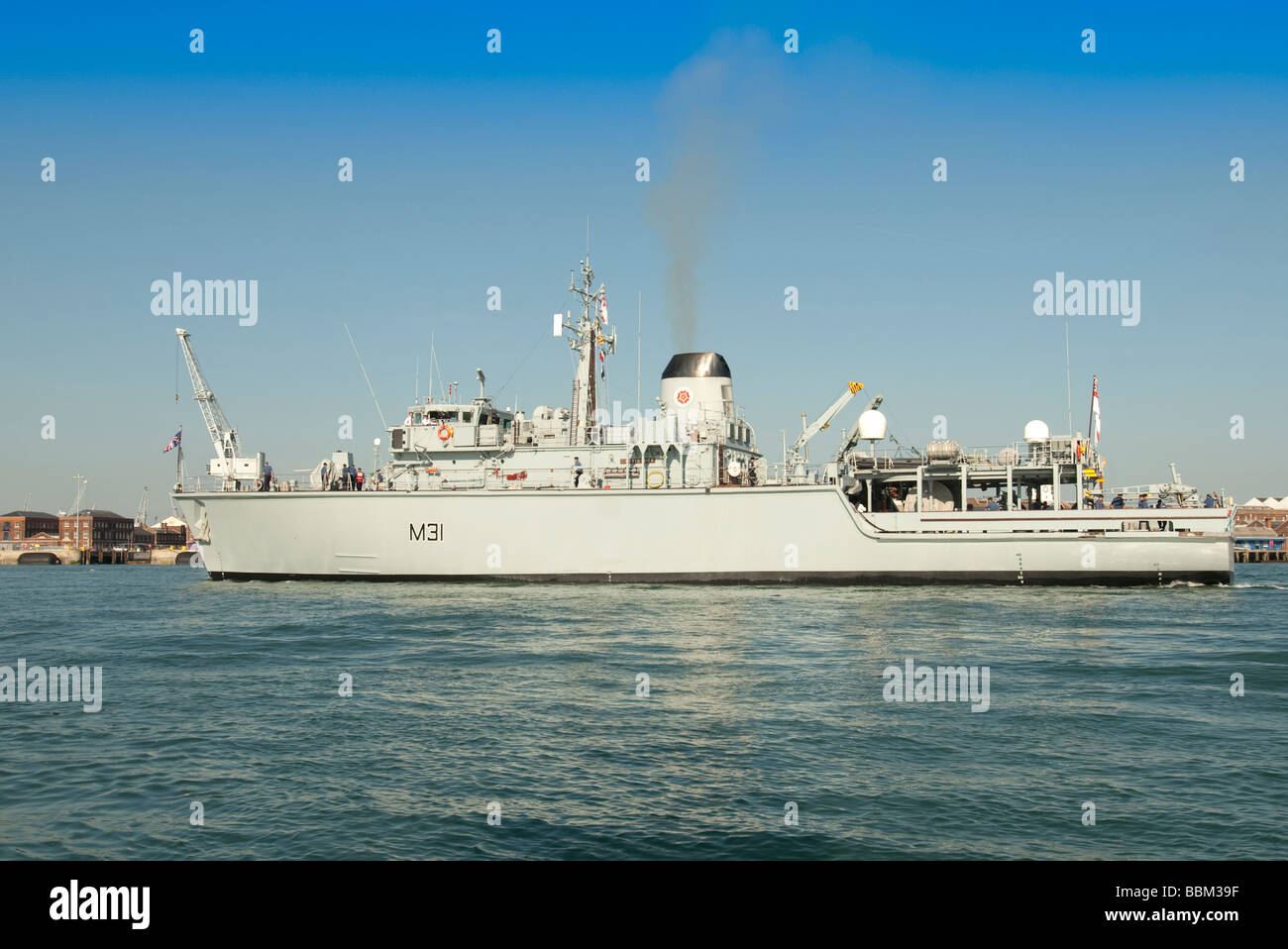 HMS Cattistock entering Portsmouth Harbour Stock Photo - Alamy