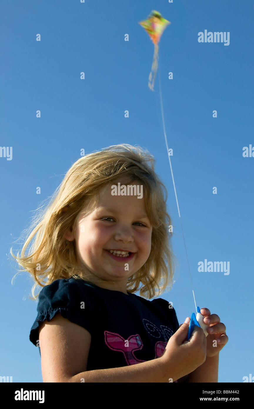 Girl with kite Stock Photo - Alamy