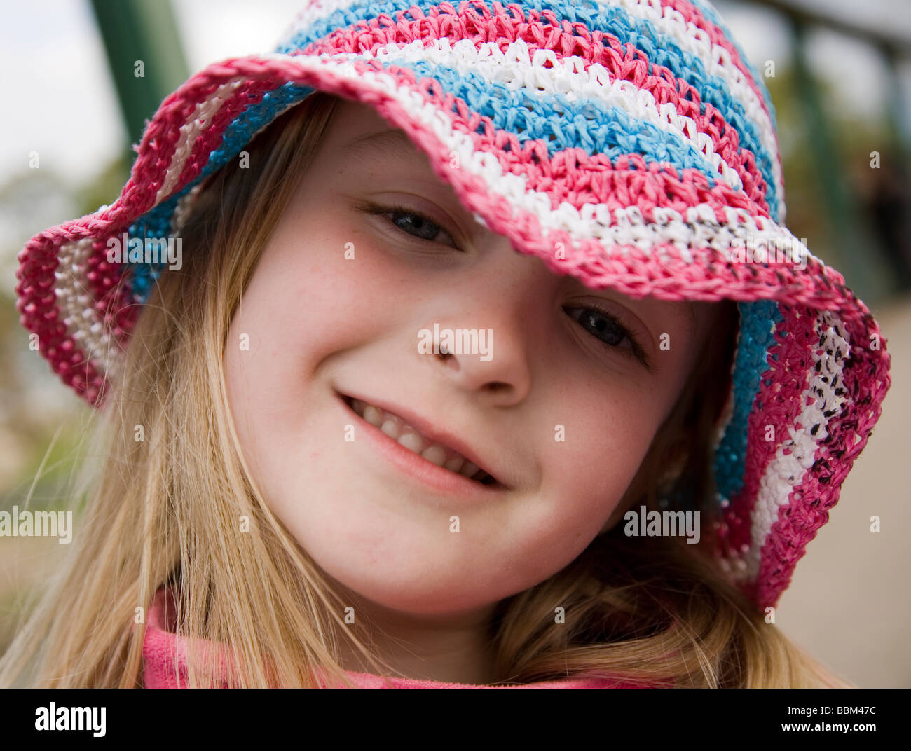 Portrait of a happy smiling six year old girl wearing sunhat Stock ...