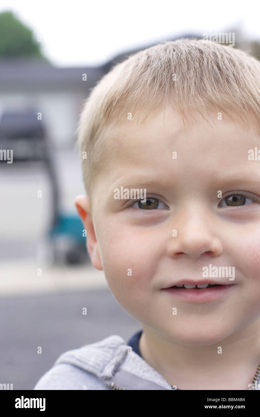 Head shot of young boy outdoors Stock Photo - Alamy