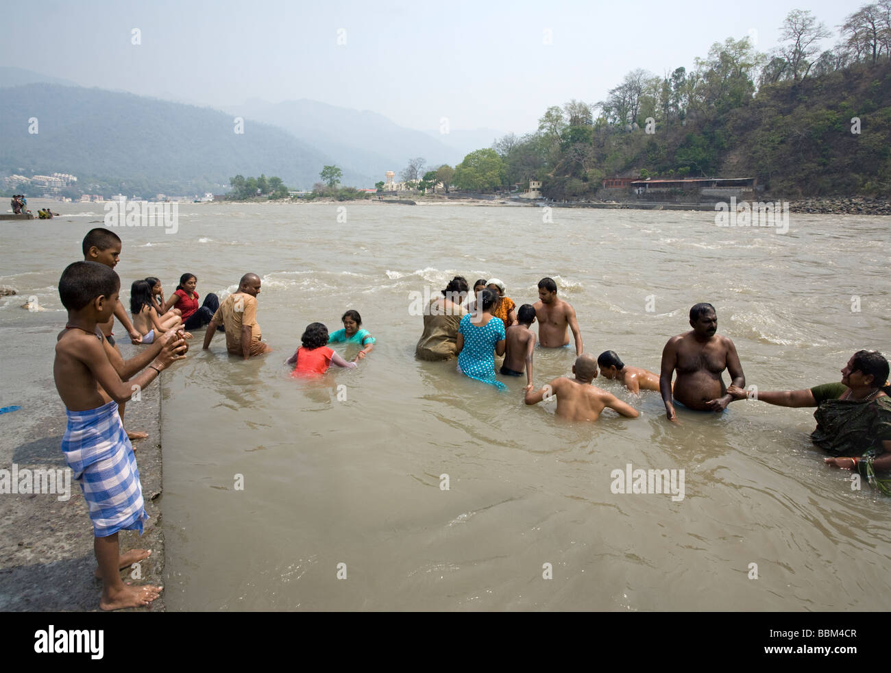 Indian woman bathing in river hi-res stock photography and images - Alamy