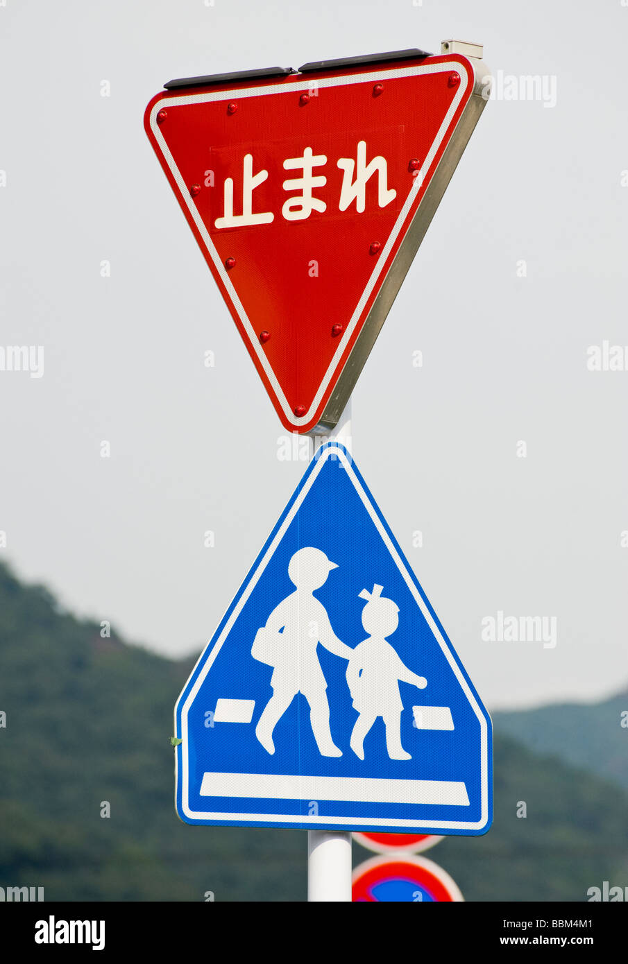 Traffic signs at intersection in Saiki Oita Prefecture Japan Stock ...