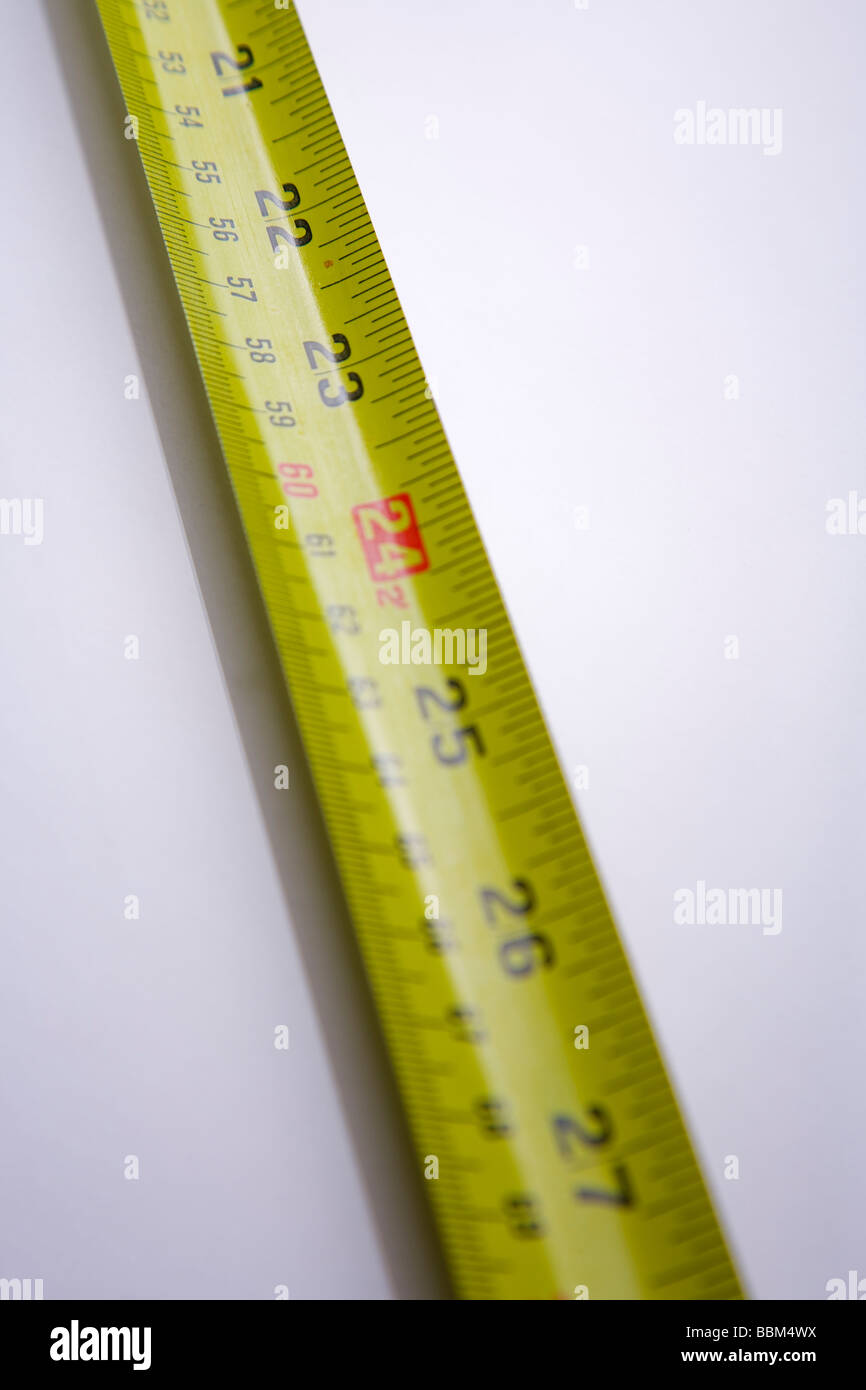 A diagonal close up of a tape measure Stock Photo - Alamy